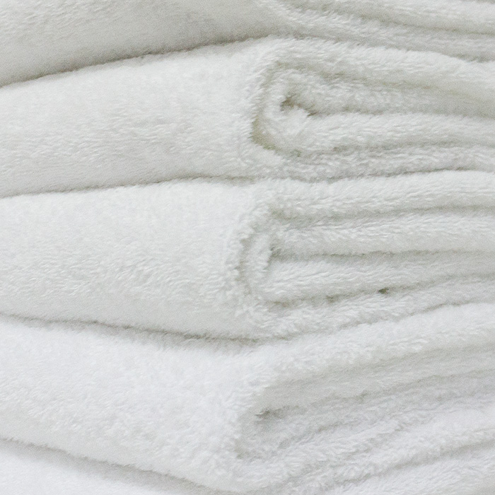 Alltex - buanderie avec service complet pour la location Hotelwäsche